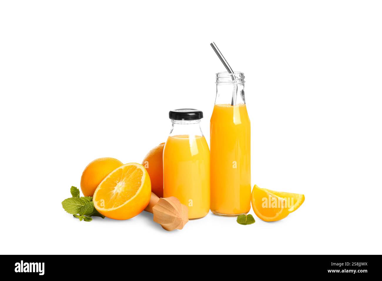 Glass and bottle of fresh orange juice with mint on white background ...