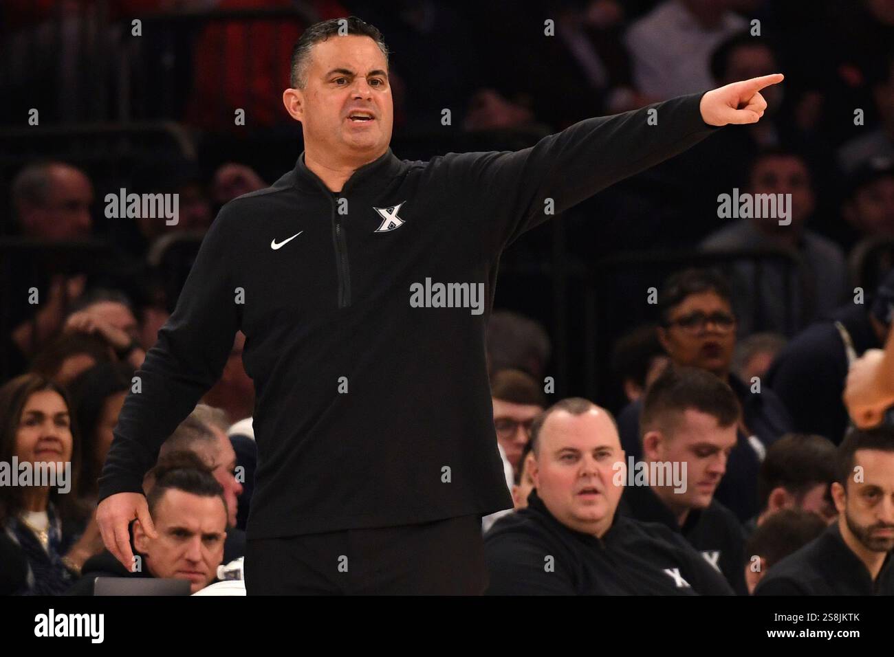 Xavier head coach Sean Miller yells on the court during the first half ...