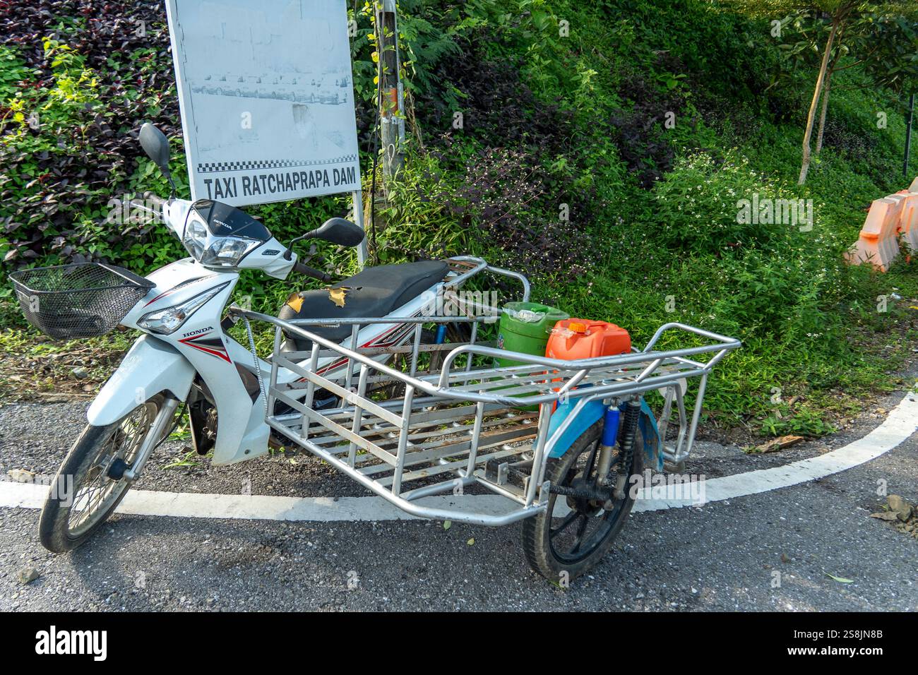 Krabi, thailand - Dec 24 2024: Three-wheeled vehicle with cart parked ...