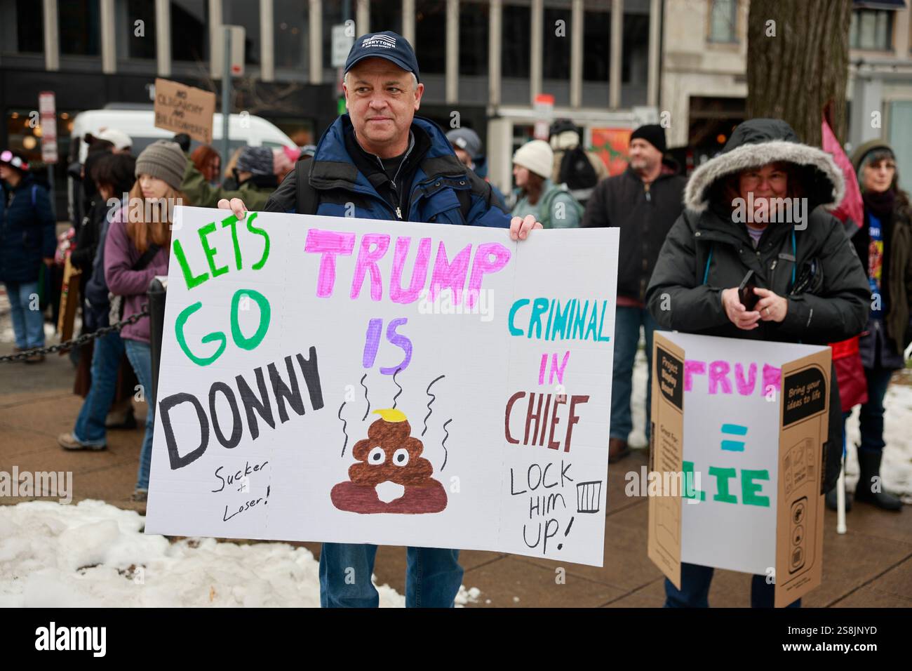 Washington, United States. 18th Jan, 2025. A protester holds a sign ...