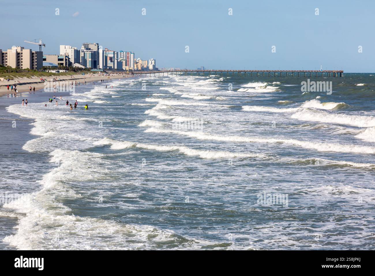 The high rise buildings of Myrtle Beach meet the waves of the Atlantic ...
