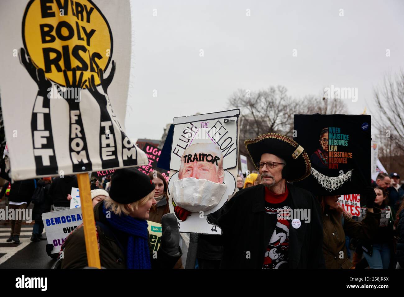 Washington, United States. 18th Jan, 2025. A protester carries a sign ...