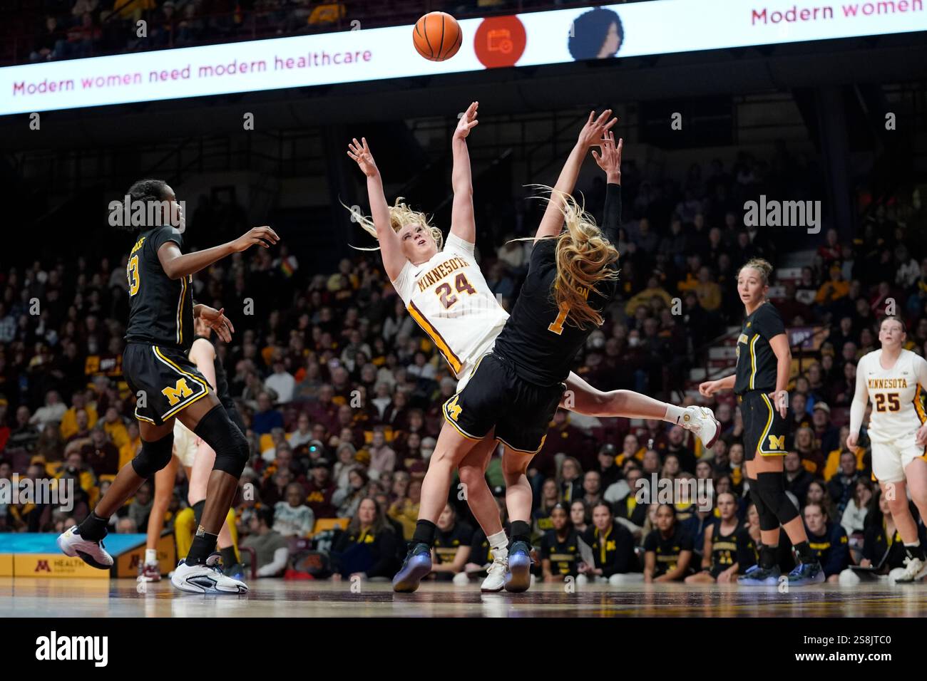 Michigan guard Olivia Olson (1) draws an offensive foul as Minnesota ...