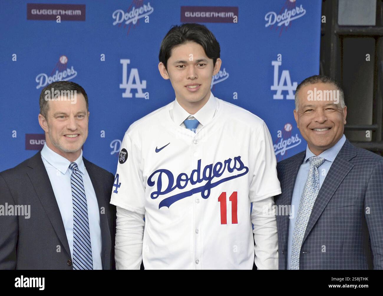Japanese pitcher Roki Sasaki, poses he is introduced by the Los Angeles ...