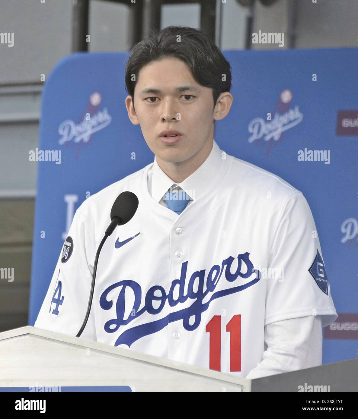 Japanese pitcher Roki Sasaki, speaks as he is introduced by the Los ...