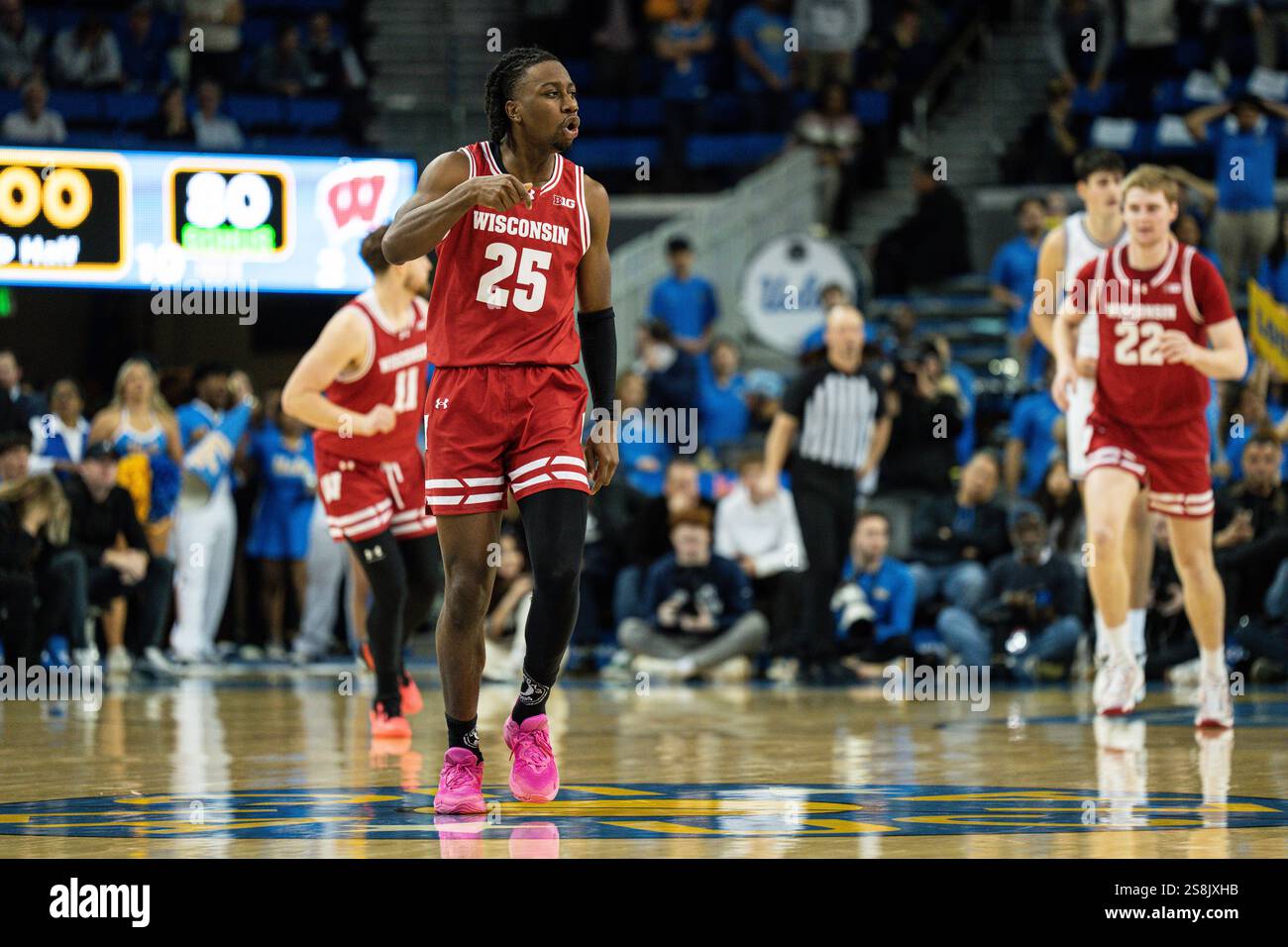 Wisconsin Badgers guard John Blackwell (25) reacts after making a three ...