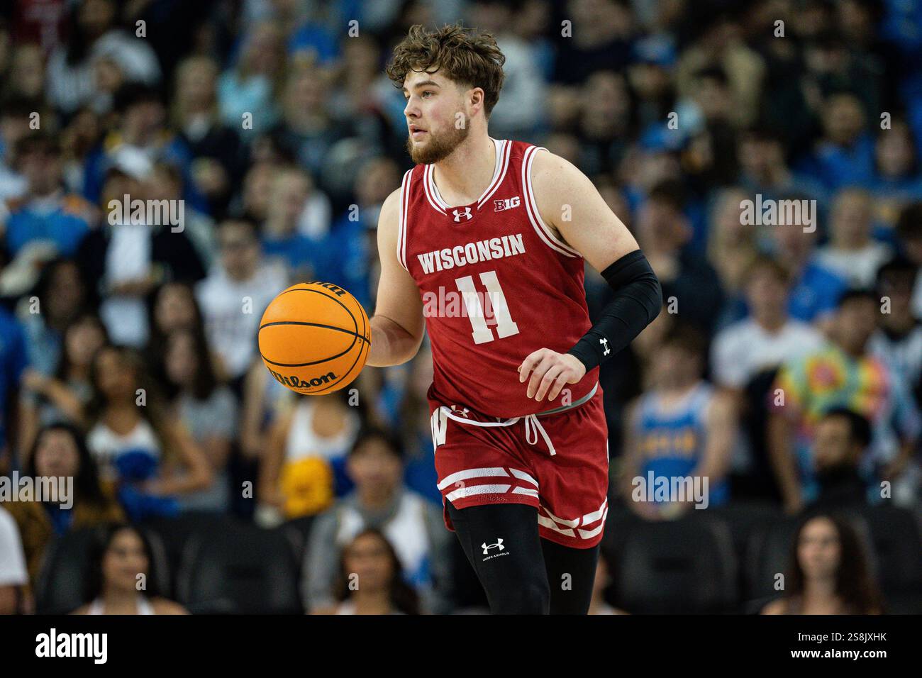 Wisconsin Badgers guard Max Klesmit (11) during a NCAA basketball game ...
