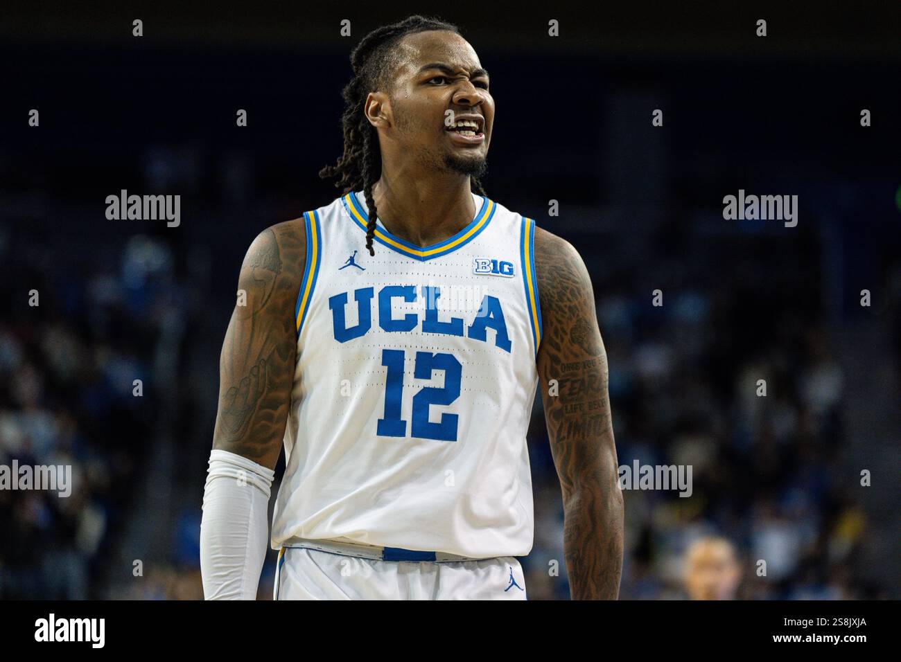 UCLA Bruins guard Sebastian Mack (12) reacts during a NCAA basketball ...