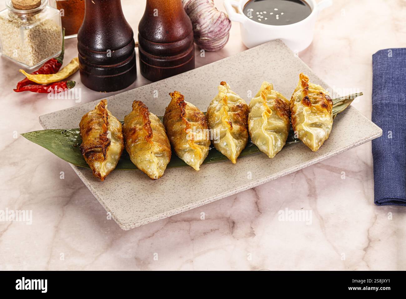 Fried Japanese stuffed dumplings - Gyoza with meat Stock Photo - Alamy
