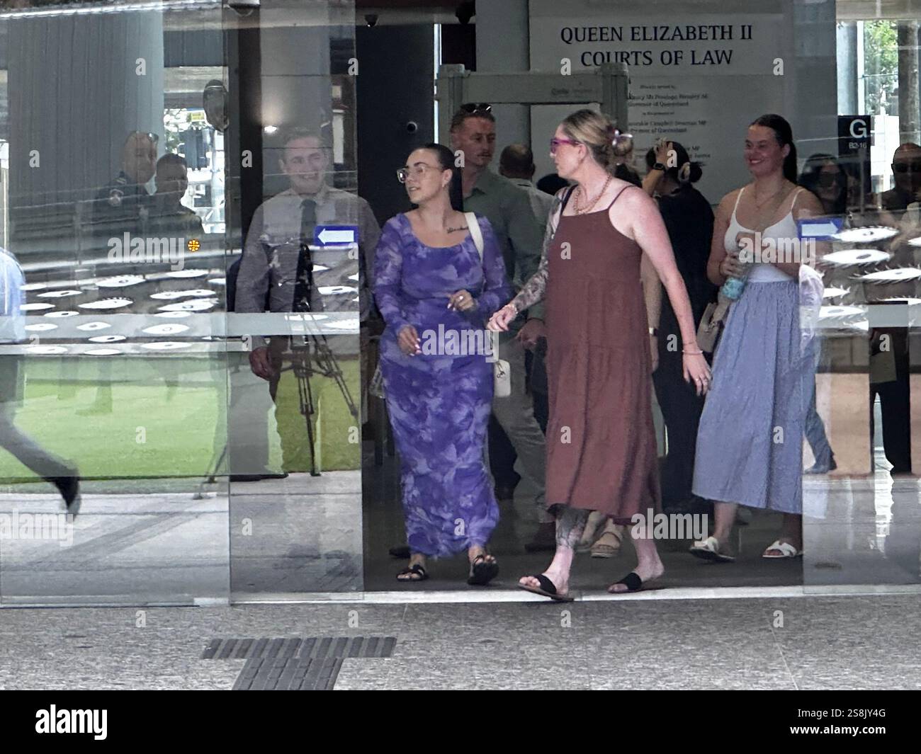 Brisbane, Australia. 23rd Jan, 2025. Daughter Olivia Godfrey (centre ...