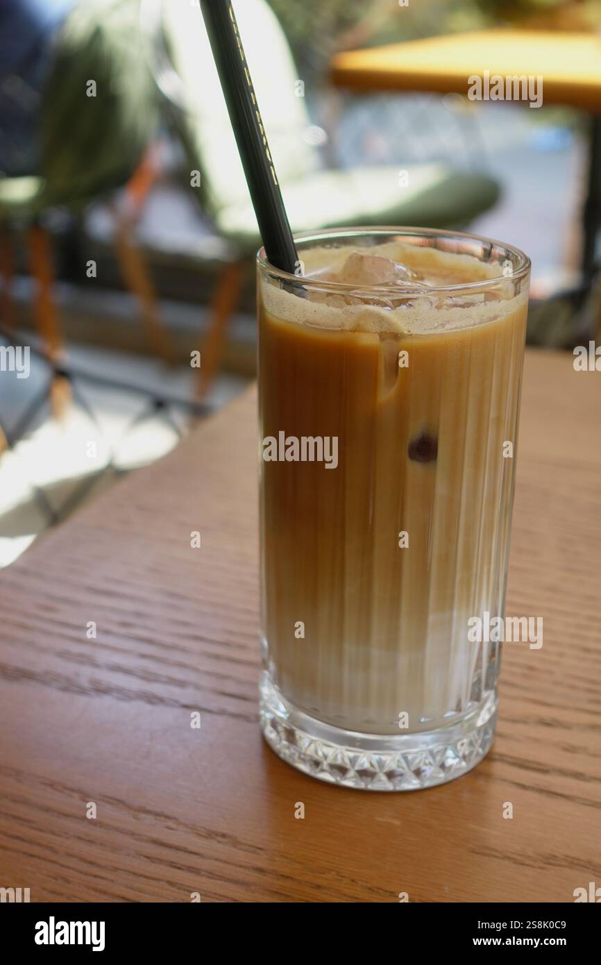 Enjoy a Refreshing Iced Coffee, complete with Ice Cubes in a Clear Glass for your delight Stock ...