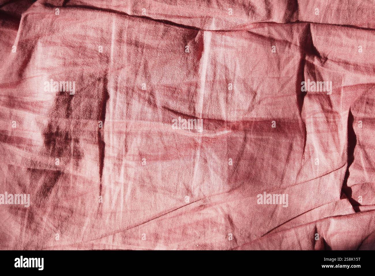 This image shows a wrinkled red fabric background for textures and ...