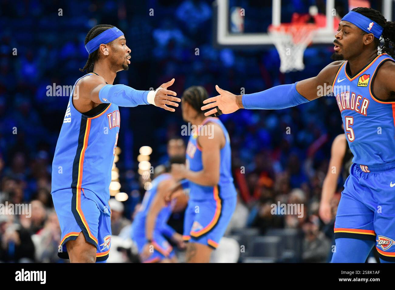 Oklahoma City Thunder guard Shai Gilgeous-Alexander, left, celebrates ...