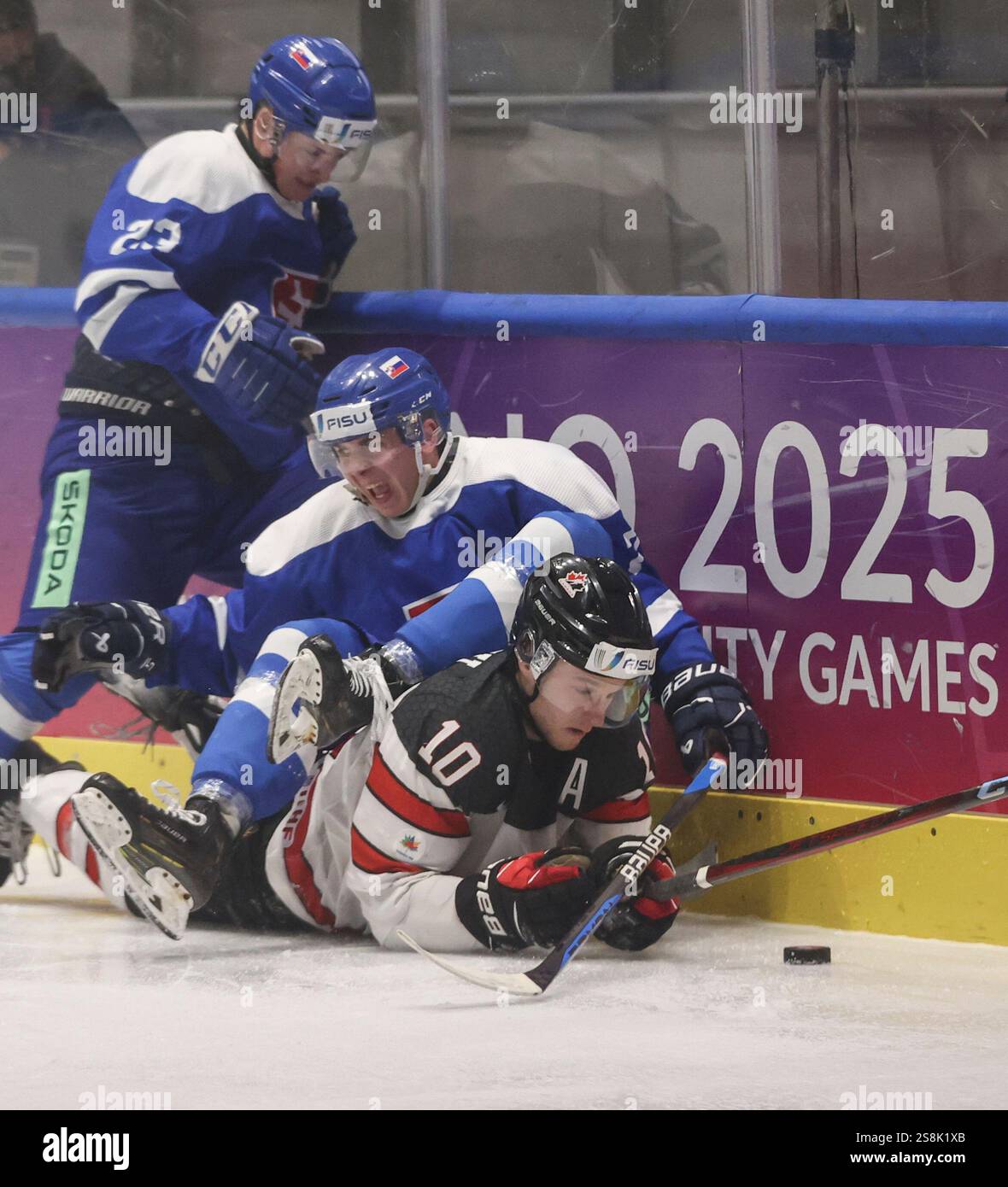 Turin, Italy. 22nd Jan, 2025. Benjamin Corbeil (bottom) of Canada ...