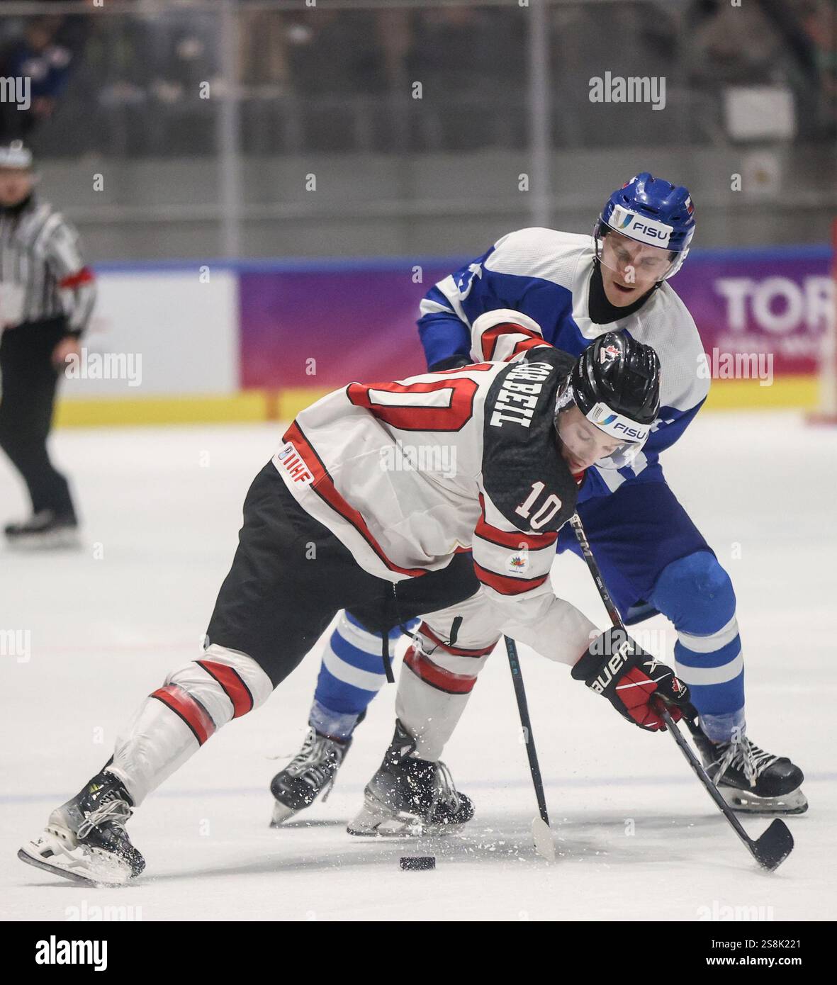 Turin, Italy. 22nd Jan, 2025. Benjamin Corbeil (front) of Canada vies ...