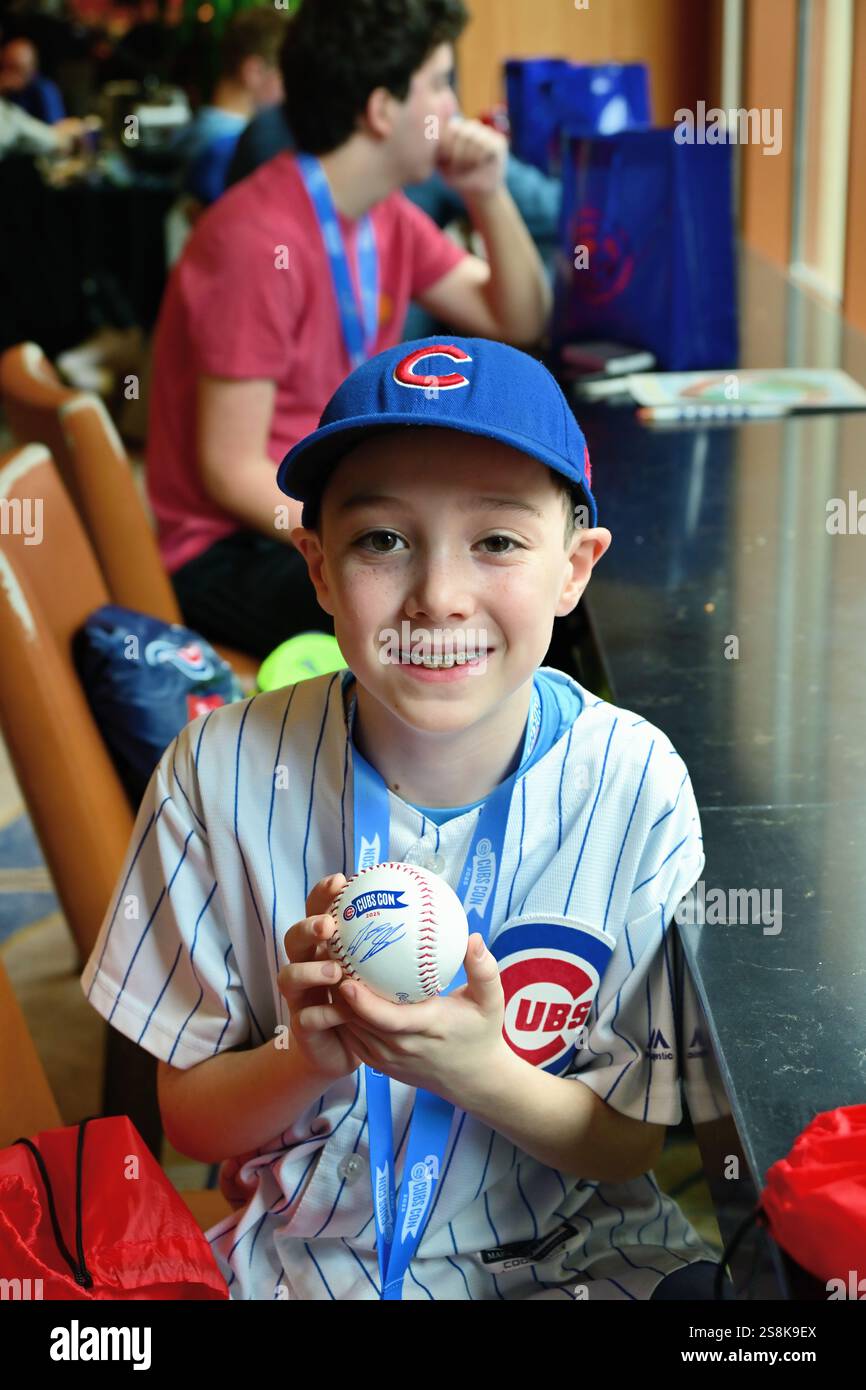 Chicago, Illinois, USA. Young Chicago Cubs fan showing off his ...