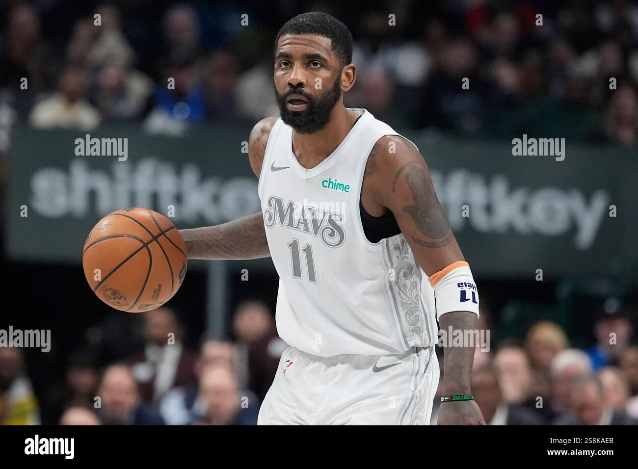 Dallas Mavericks guard Kyrie Irving dribbles during the second half of ...