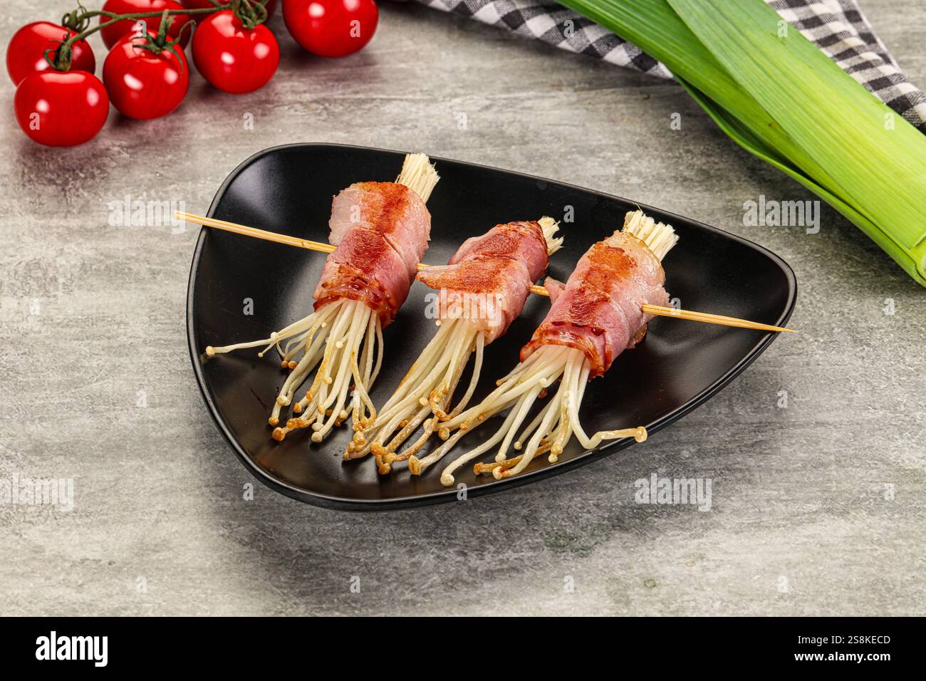 Grilled enoki mushroom with bacon roll wrap Stock Photo - Alamy