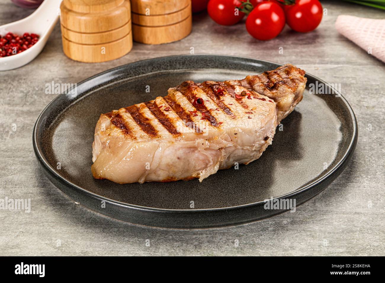 Grilled fat pork loin steak with bone Stock Photo - Alamy