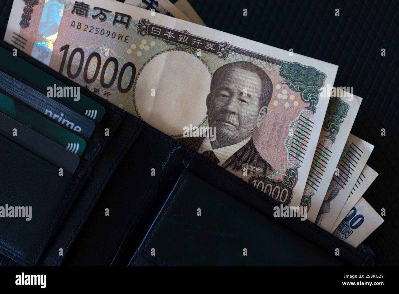 Yokohama, Japan. 20th Nov, 2024. New 10.000 Yen bill sticks out from a ...
