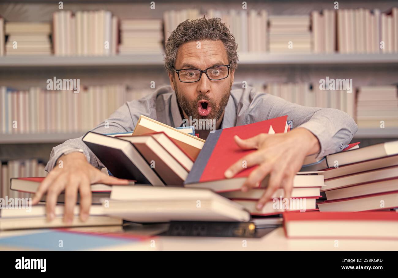 school teacher loves education. bookworm nerd in school library ...