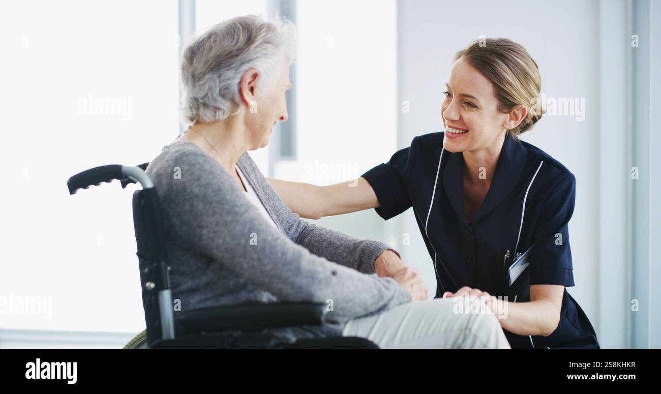 Clinic, caregiver and kindness for woman with disability, smile and ...