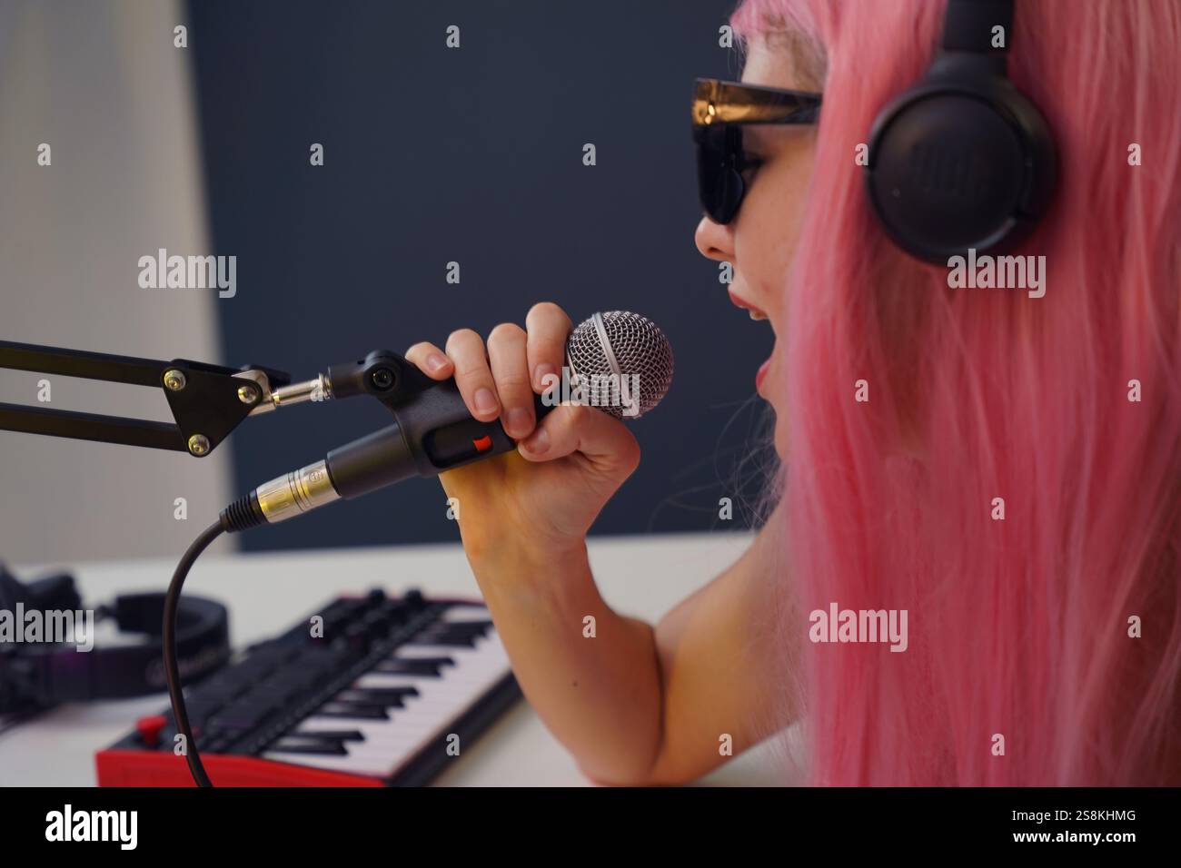 Beautiful young singer and musician broadcast from her home studio ...