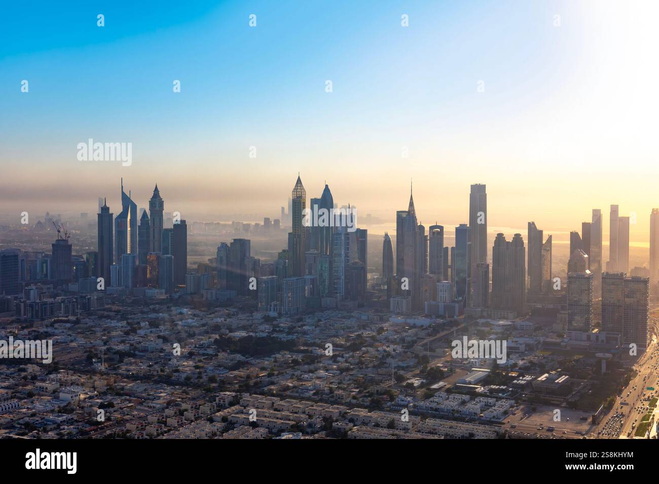 Aerial panoramic view of Dubai city early morning during fog. Sunrise ...