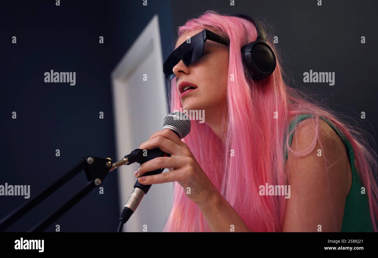 Beautiful young singer and musician broadcast from her home studio ...