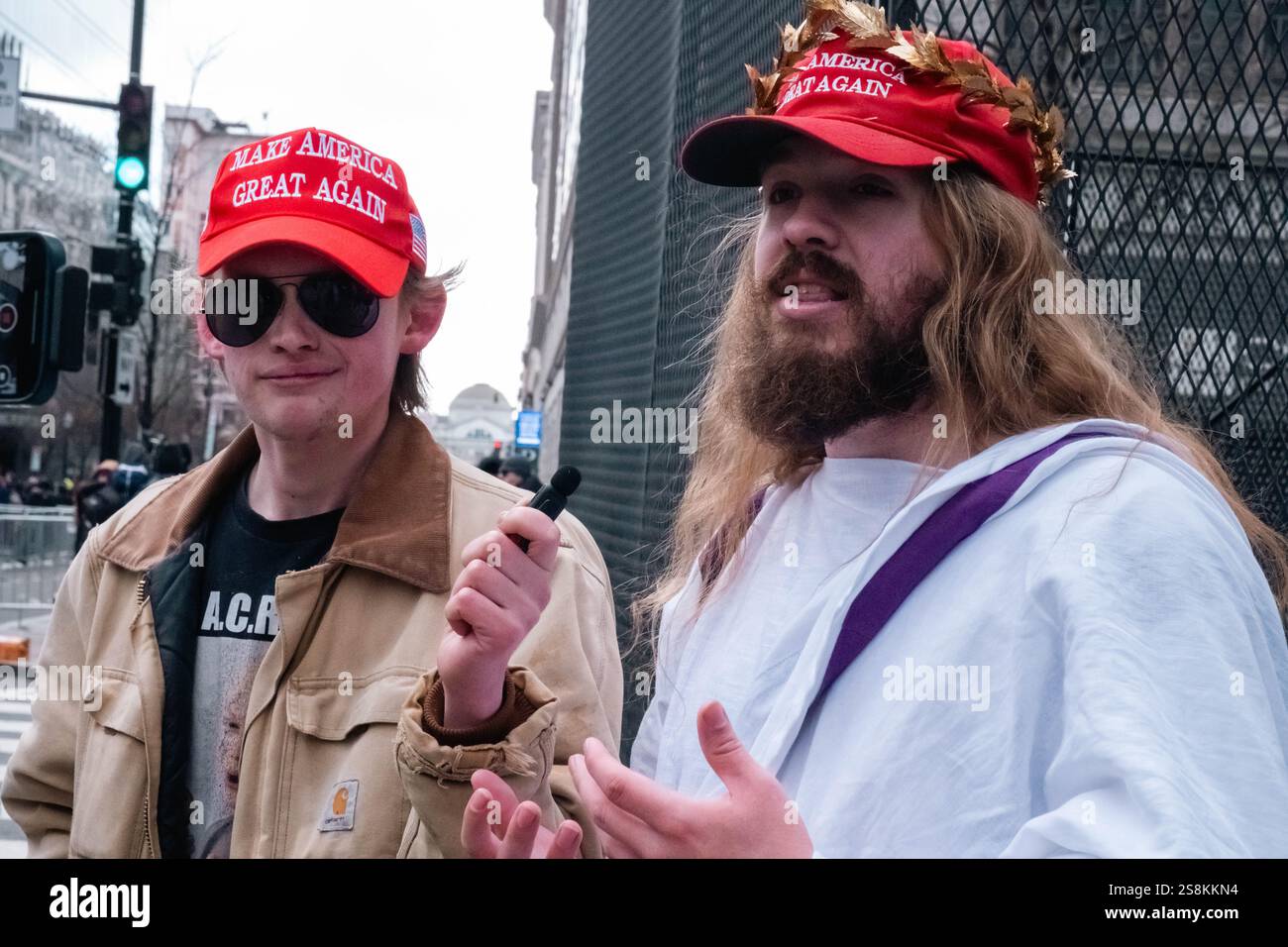 Washington D.C, USA. 20th Jan, 2025. Two men are seen wearing red Trump ...