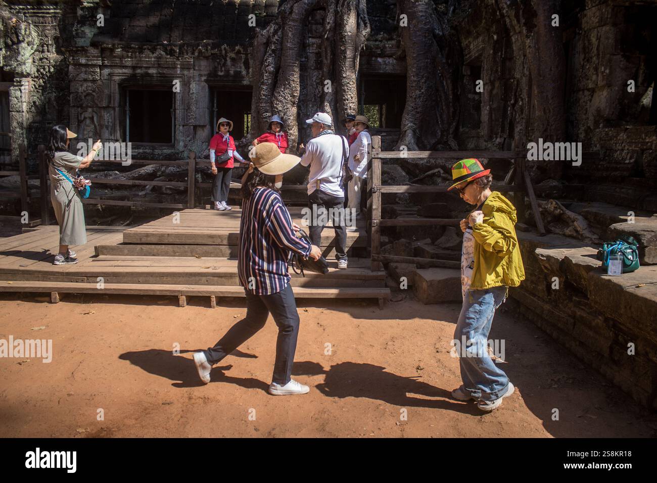 Siem reap, Cambodia, January 21, 2025 Tourists visiting Ta Prohm temple ...