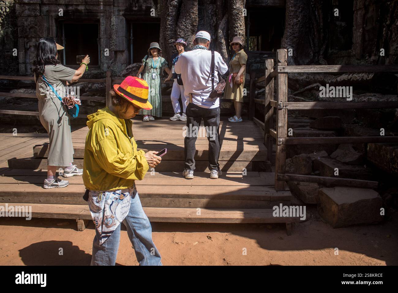 Siem reap, Cambodia, January 21, 2025 Tourists visiting Ta Prohm temple ...