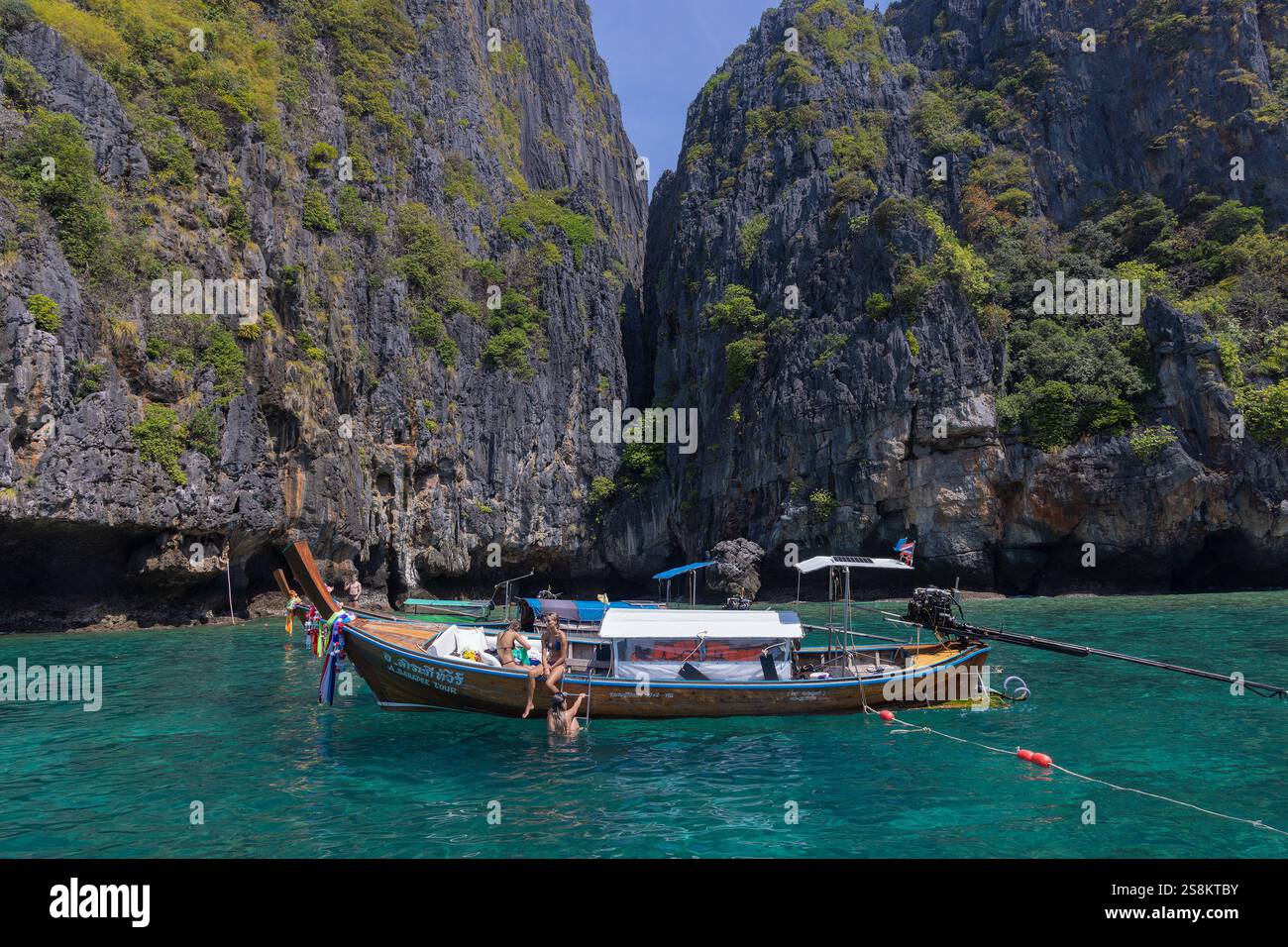 Tourist longboats in Ko Koh Phi Phi Leh Island, Thailand Stock Photo - Alamy