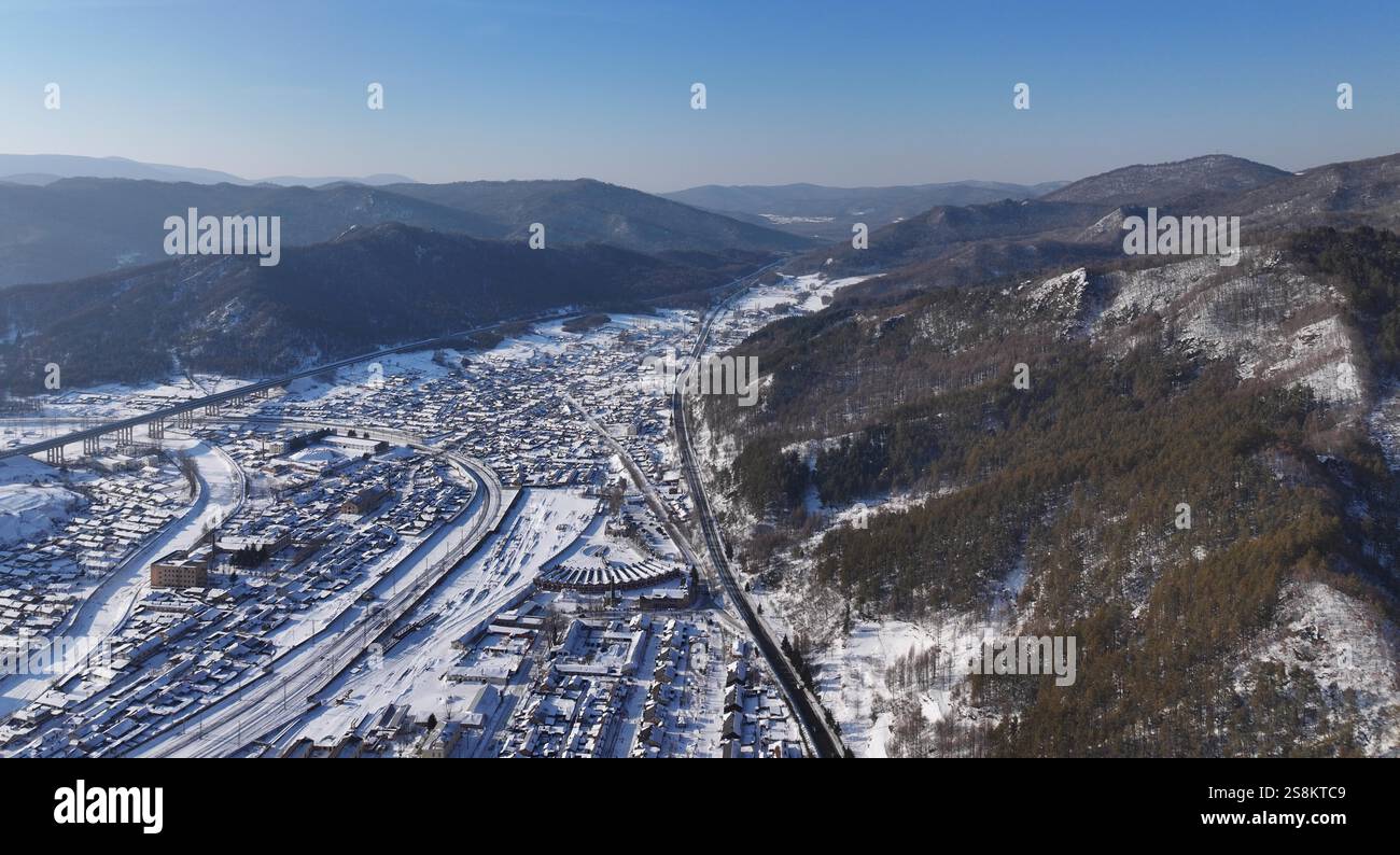 Aerial photo shows the snow-covered town scenery in Mudanjiang City ...