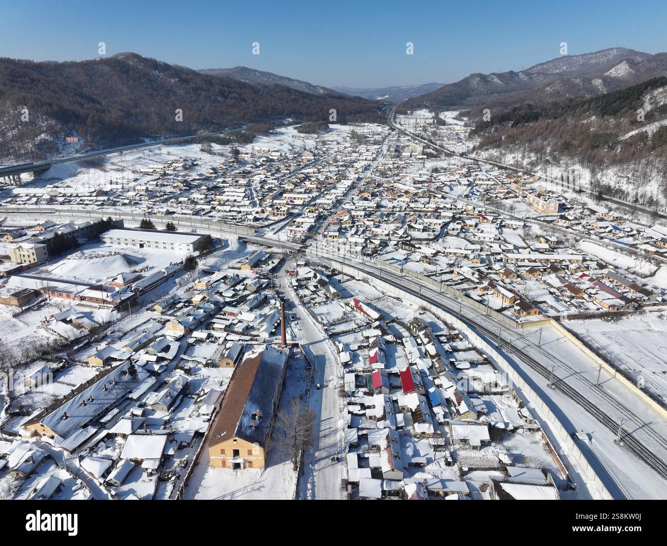 Aerial photo shows the snow-covered town scenery in Mudanjiang City ...