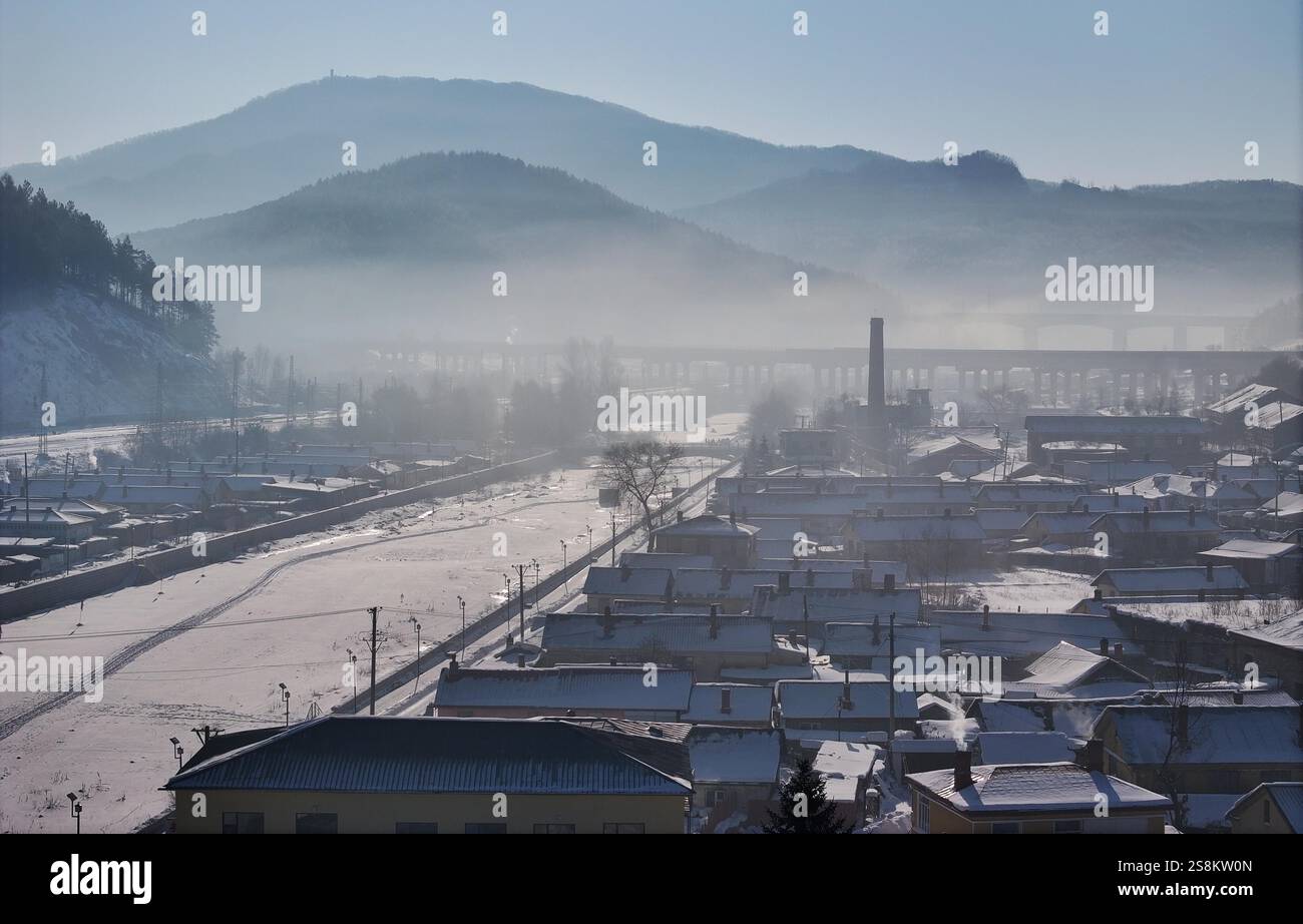 Aerial photo shows the snow-covered town scenery in Mudanjiang City ...