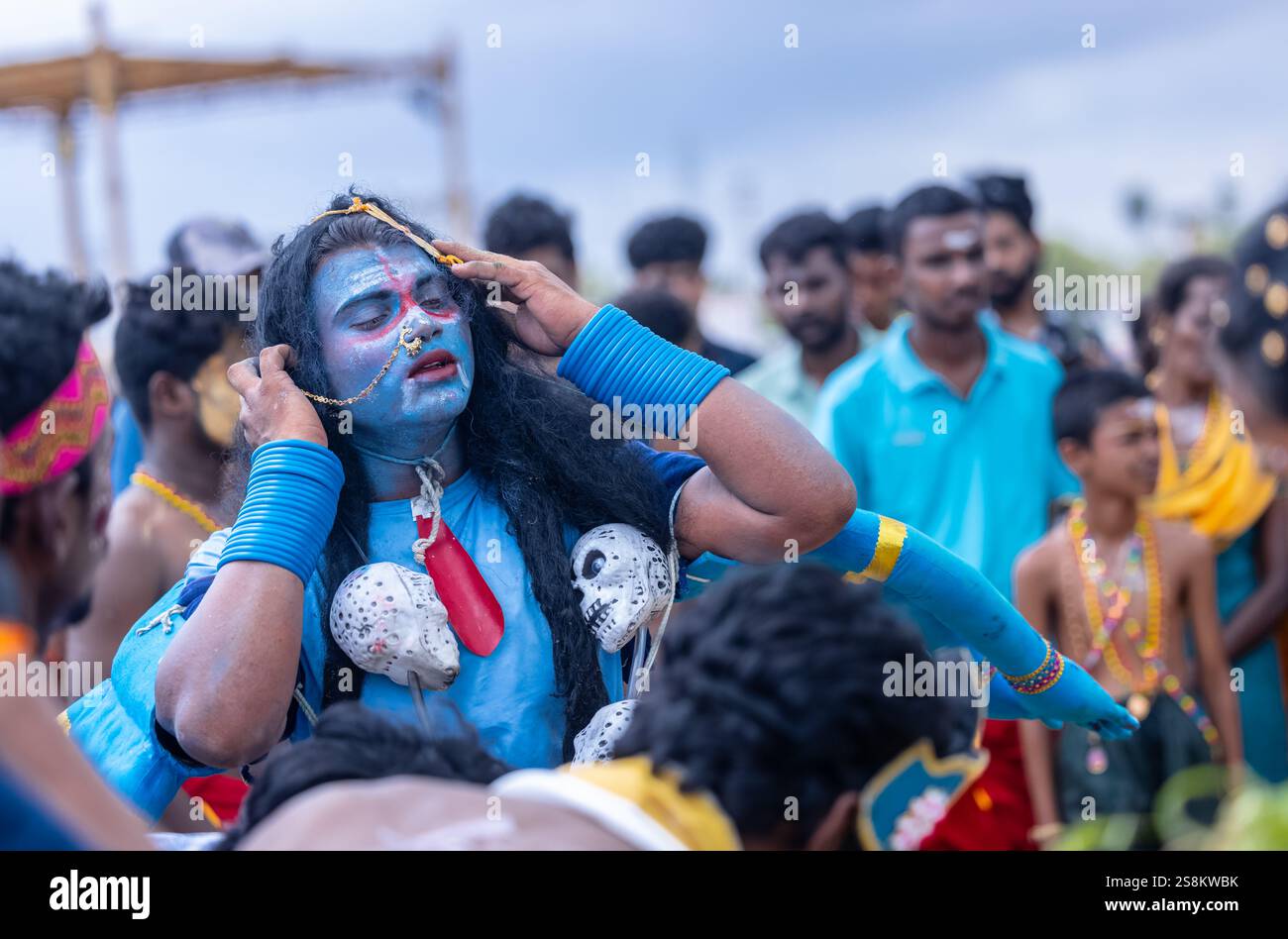 Kulasai, Portrait of indian hindu devotee with painted face and dressed ...
