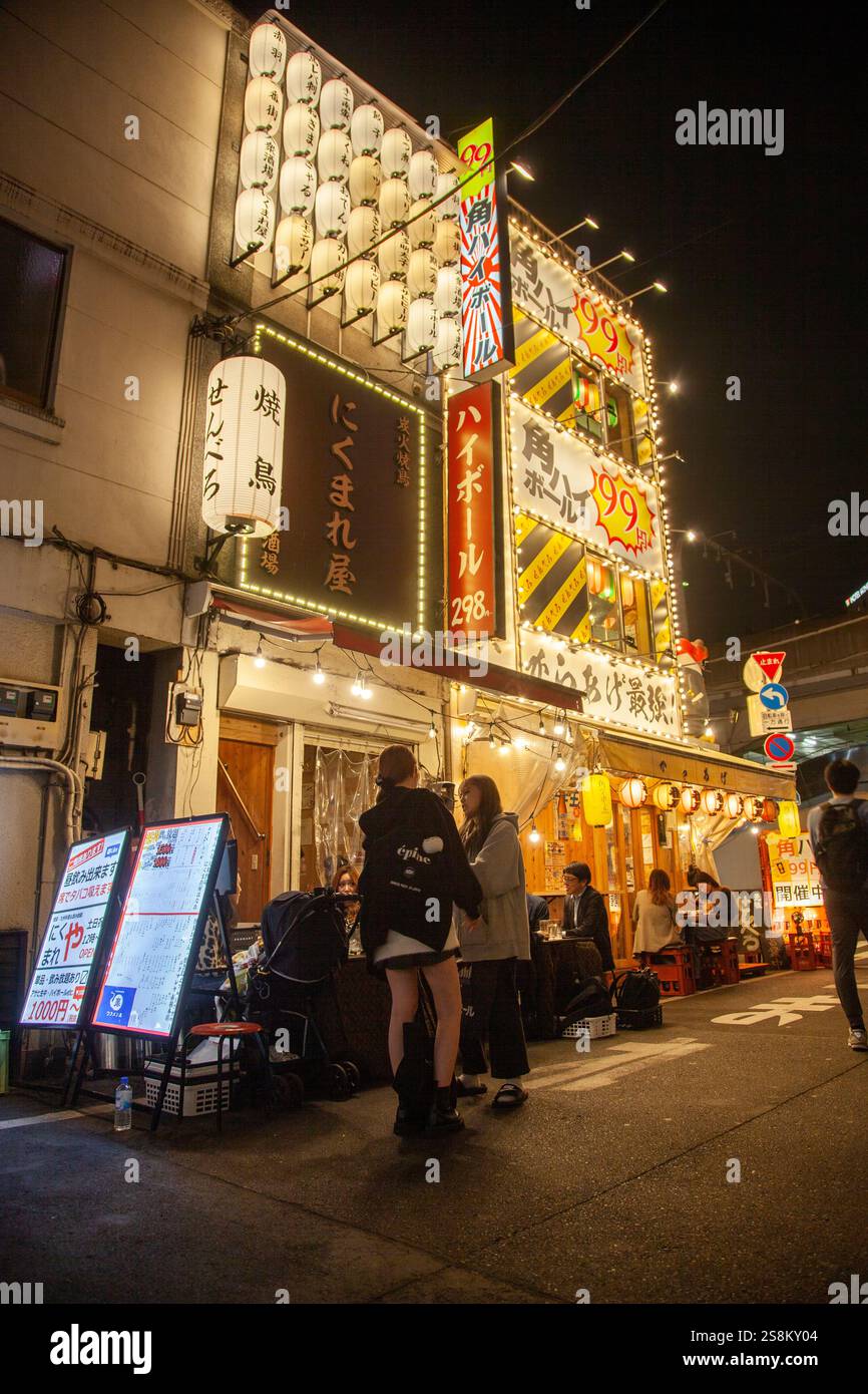 A Japanese alley at night with restaurants and bars in the Akabane ...