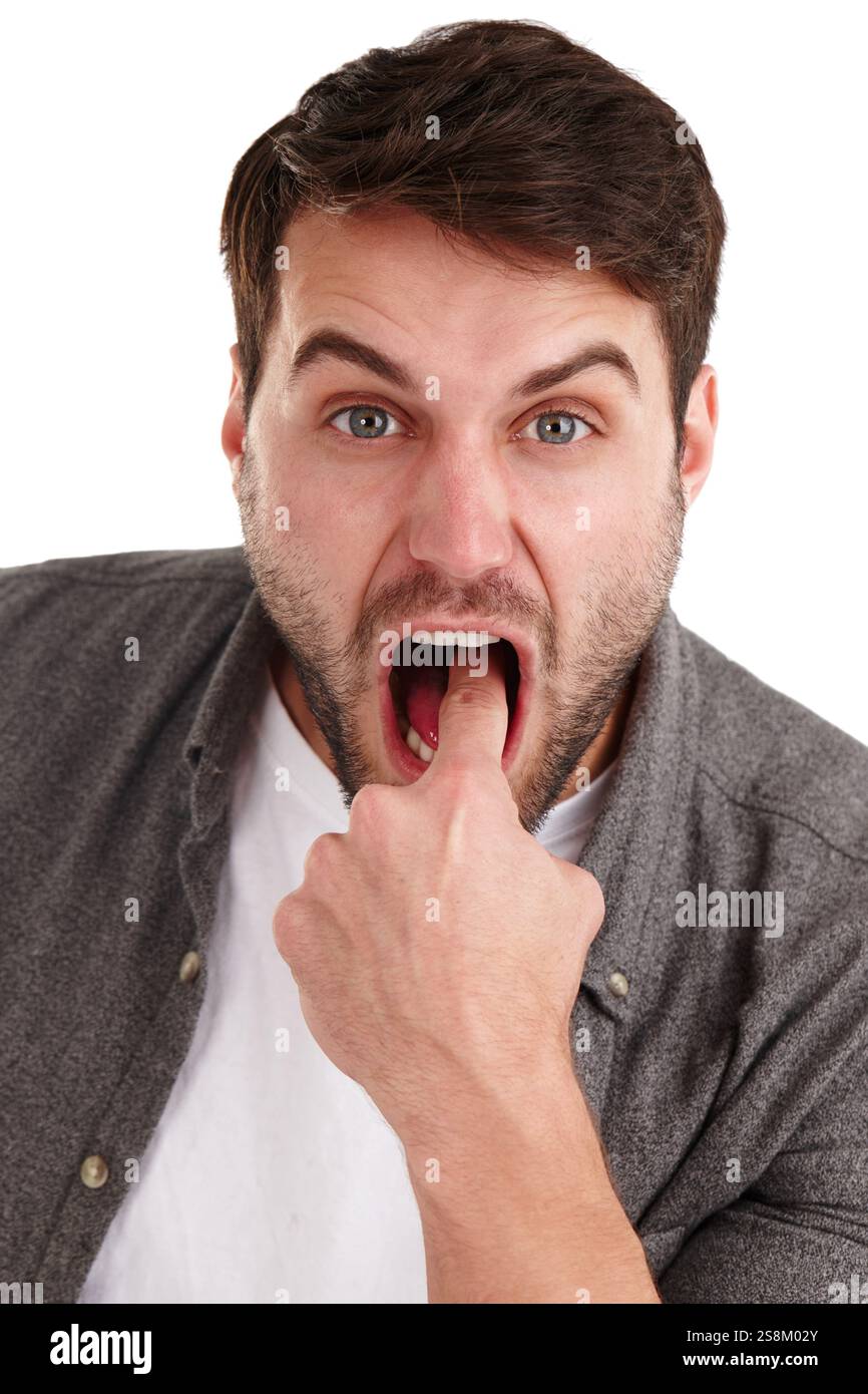 Finger in mouth, disgust and sick gesture for man on white studio ...
