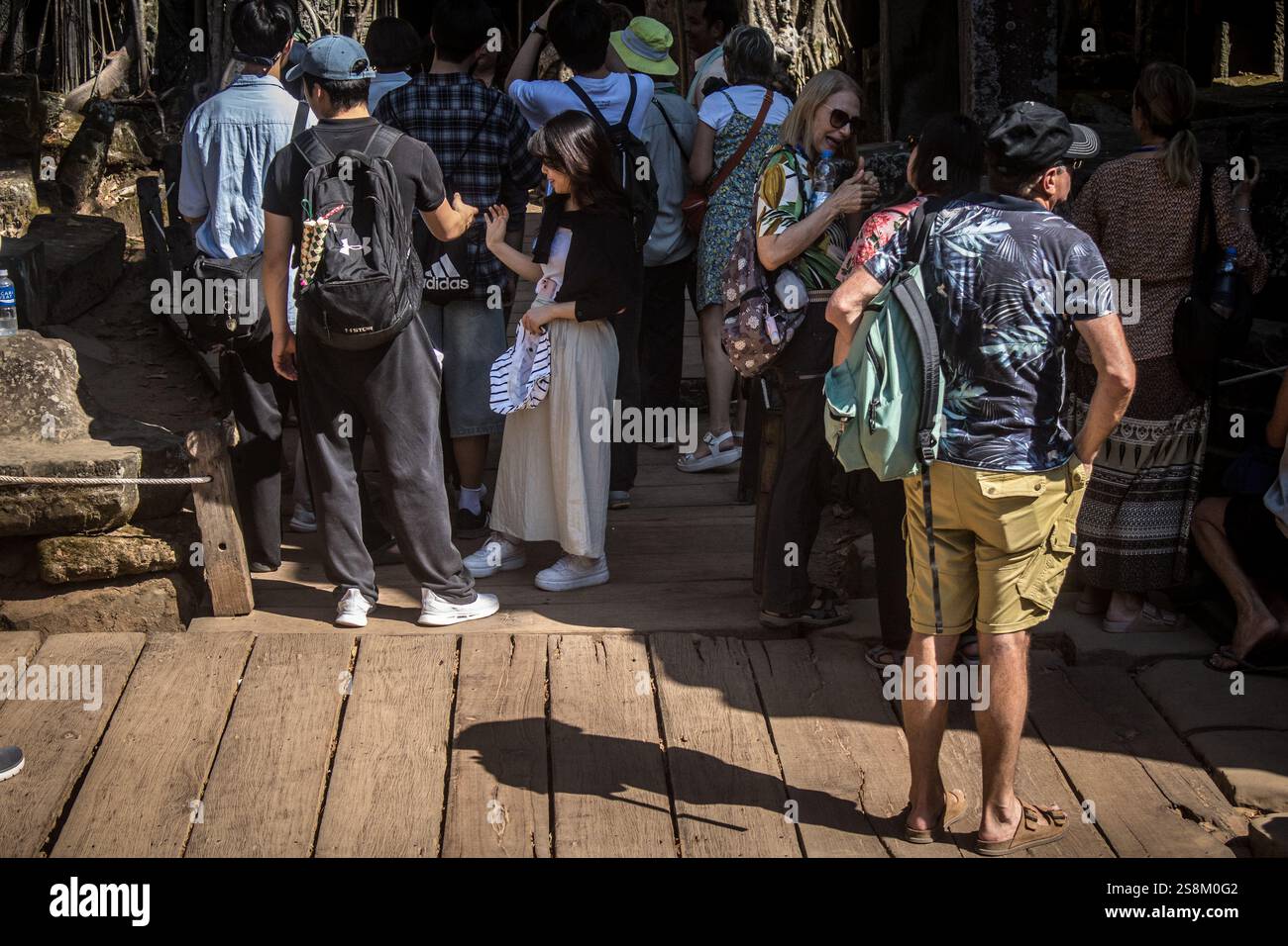 Siem reap, Cambodia, January 21, 2025 Tourists visiting Ta Prohm temple ...