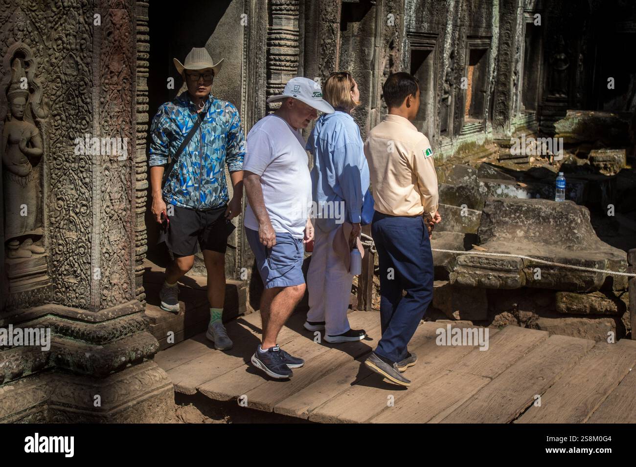 Siem reap, Cambodia, January 21, 2025 Tourists visiting Ta Prohm temple ...