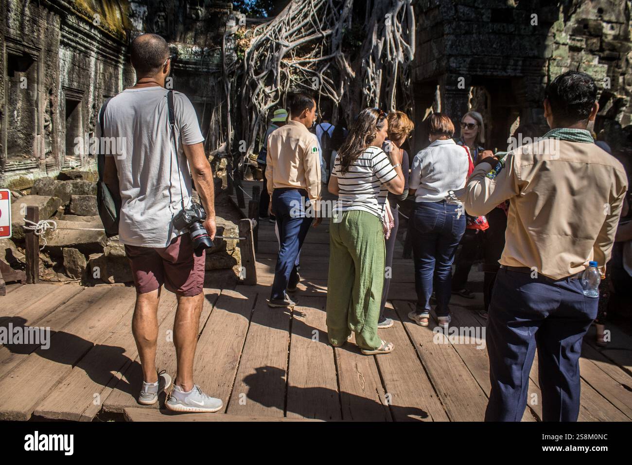 Siem reap, Cambodia, January 21, 2025 Tourists visiting Ta Prohm temple ...