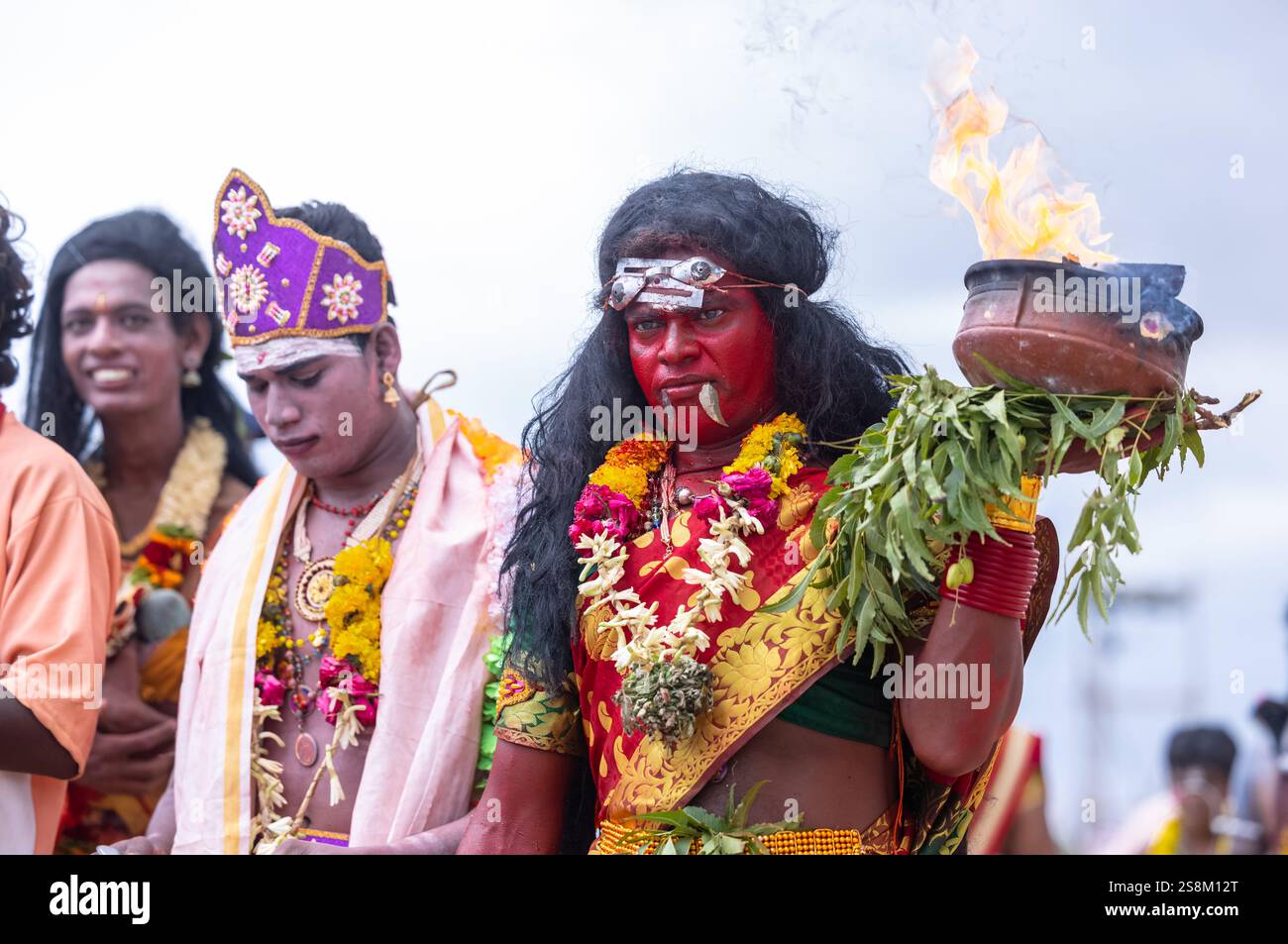 Kulasai, Portrait of indian hindu devotee with painted face and dressed ...