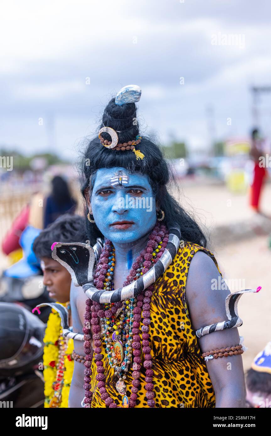 Kulasai, Portrait of indian hindu devotee with painted face and dressed ...