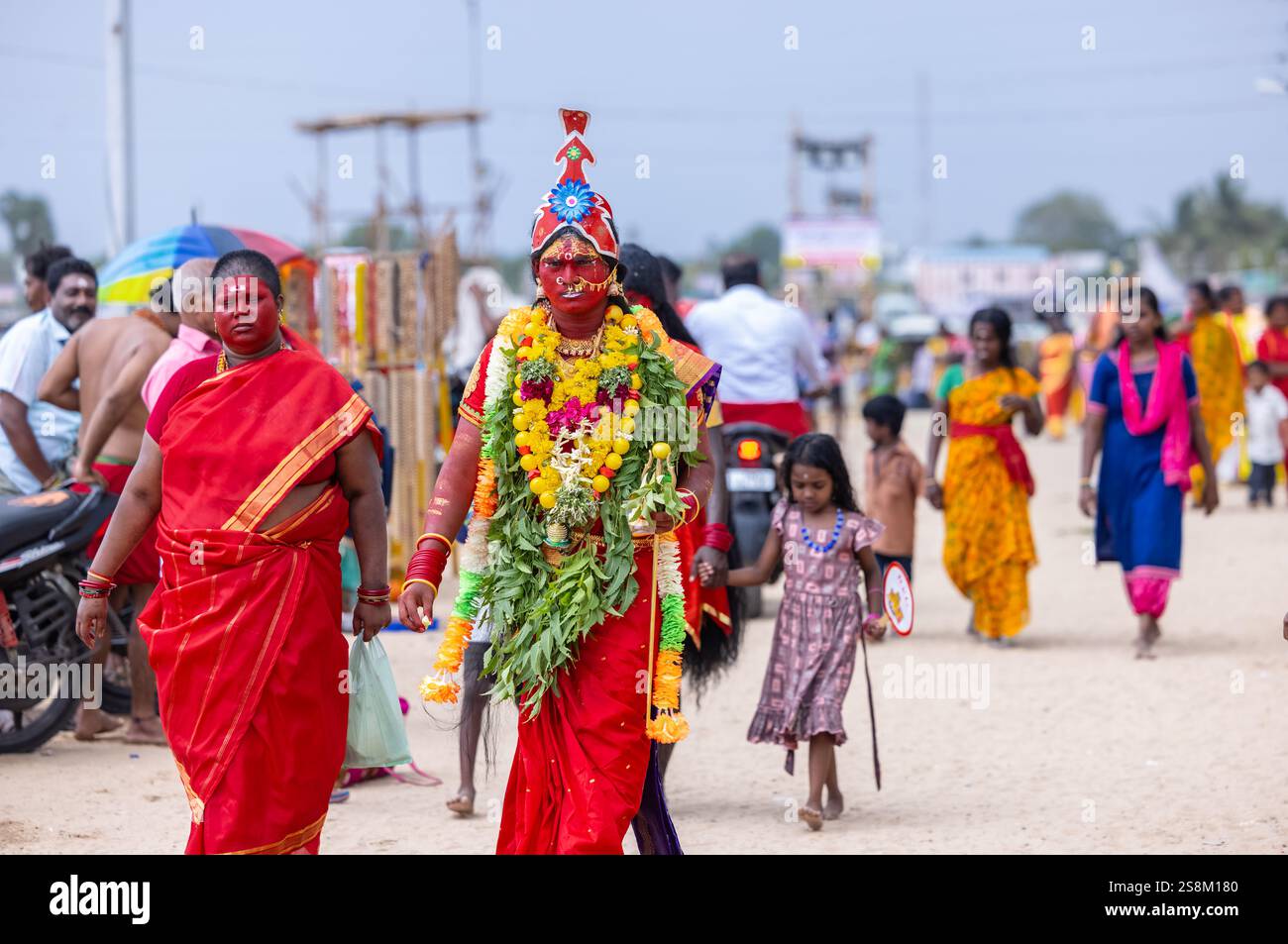 Kulasai, Portrait of indian hindu devotee with painted face and dressed ...