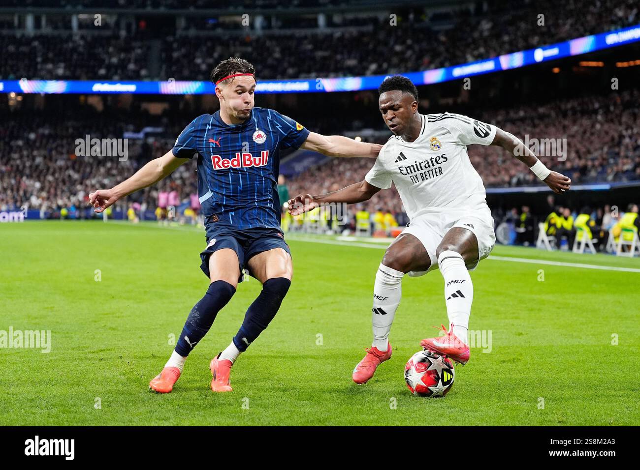 Vinicius Junior of Real Madrid and Amar Dedic of RB Salzburg during the ...
