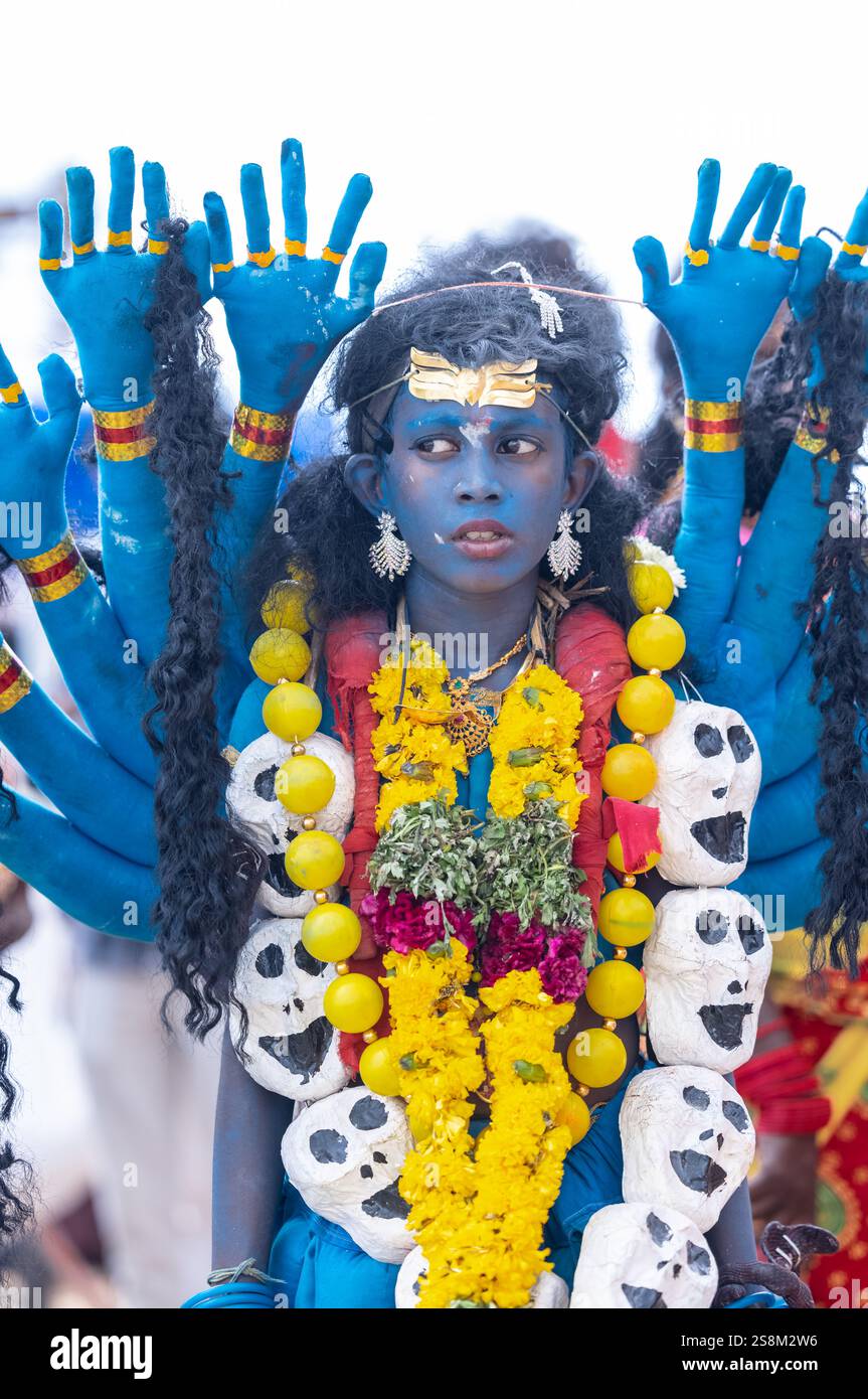 Kulasai, Portrait of indian hindu devotee with painted face and dressed ...