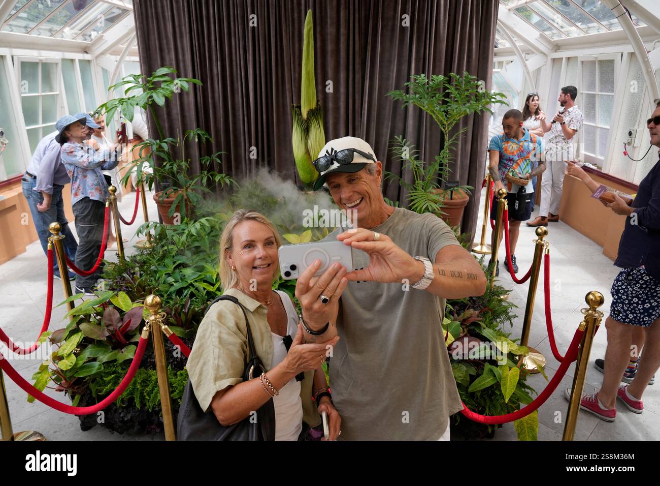 Karen, center left, and Wayne McKay photograph themselves with an ...