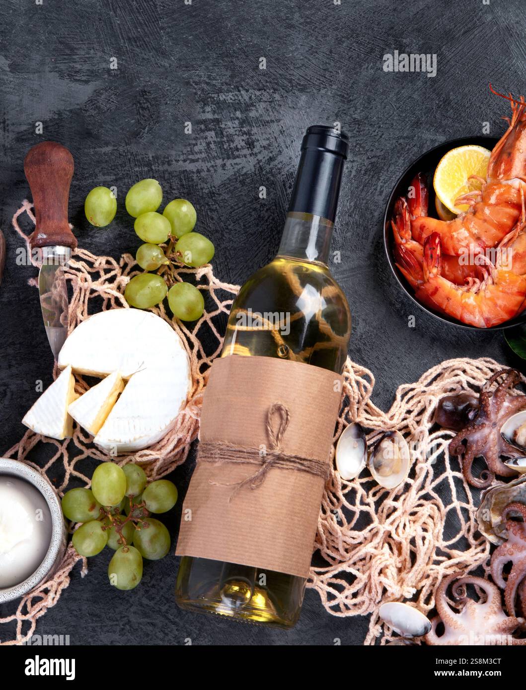 White wine with seafood and snacks. Traditional alcohol drinks Stock ...