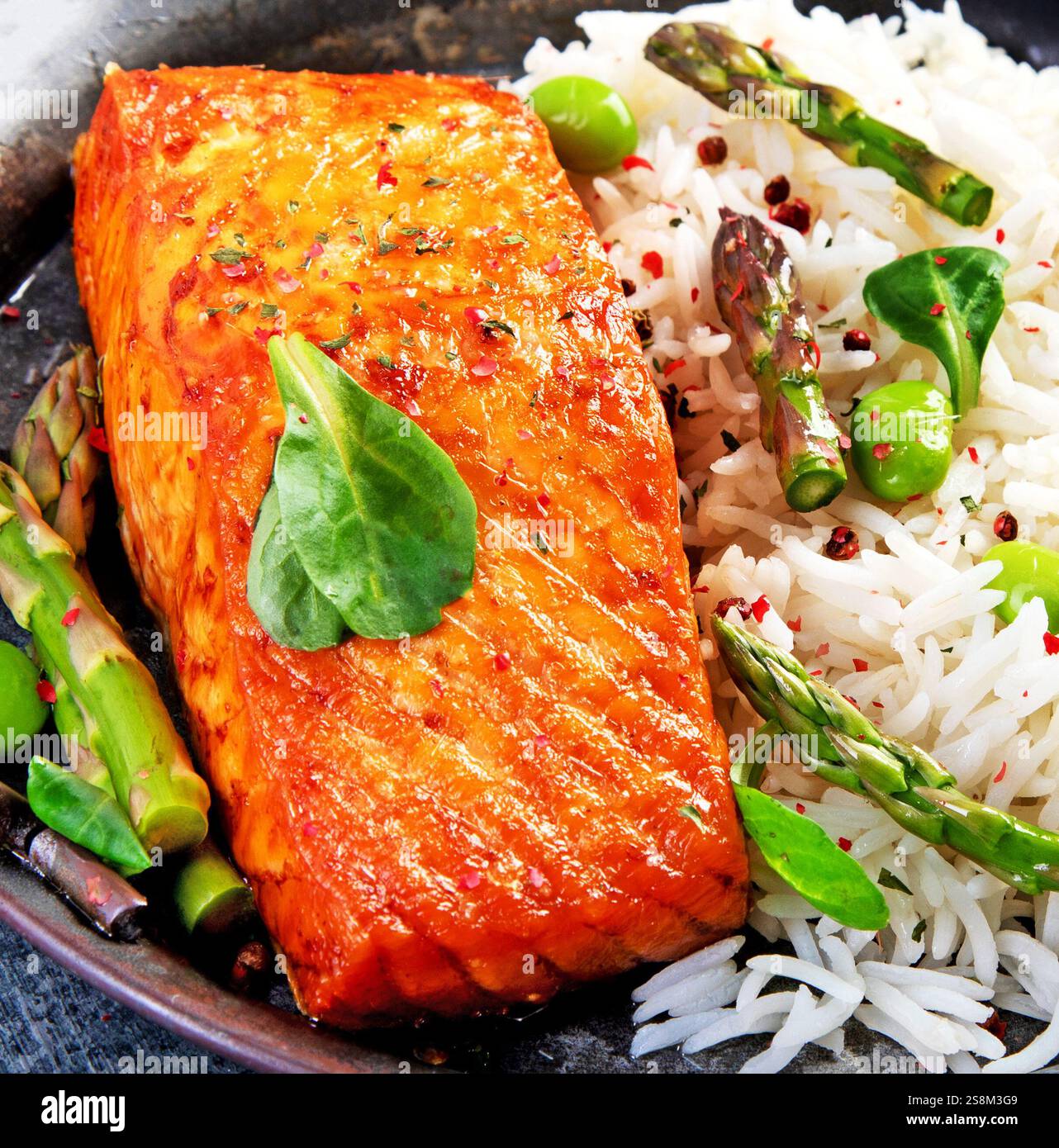 Baked salmon with rice and asparagus.. Mediterranean diet concept Stock ...